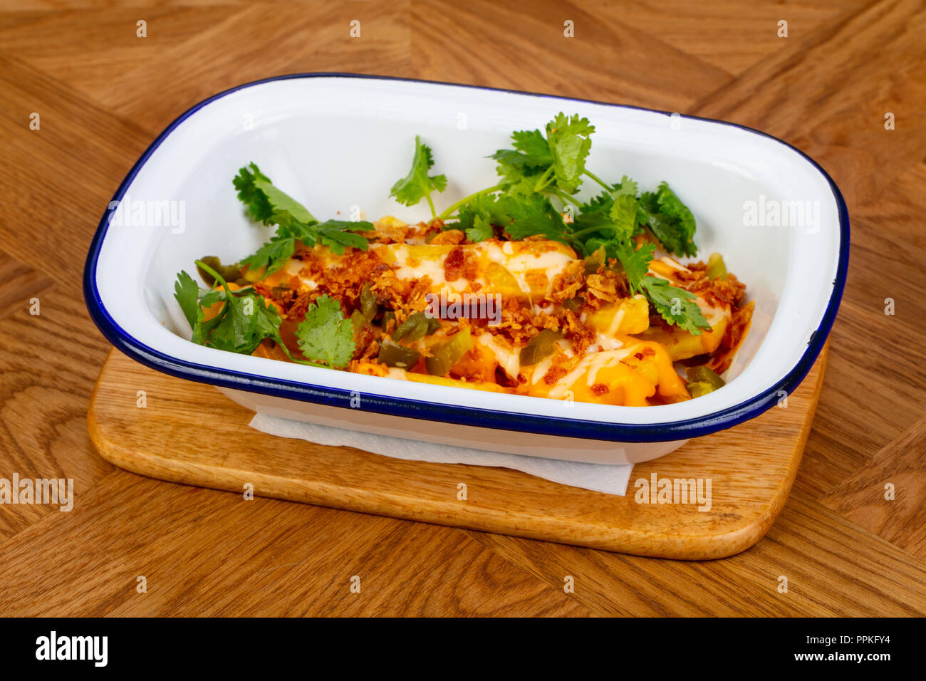 French fry with cheese sauce Stock Photo - Alamy