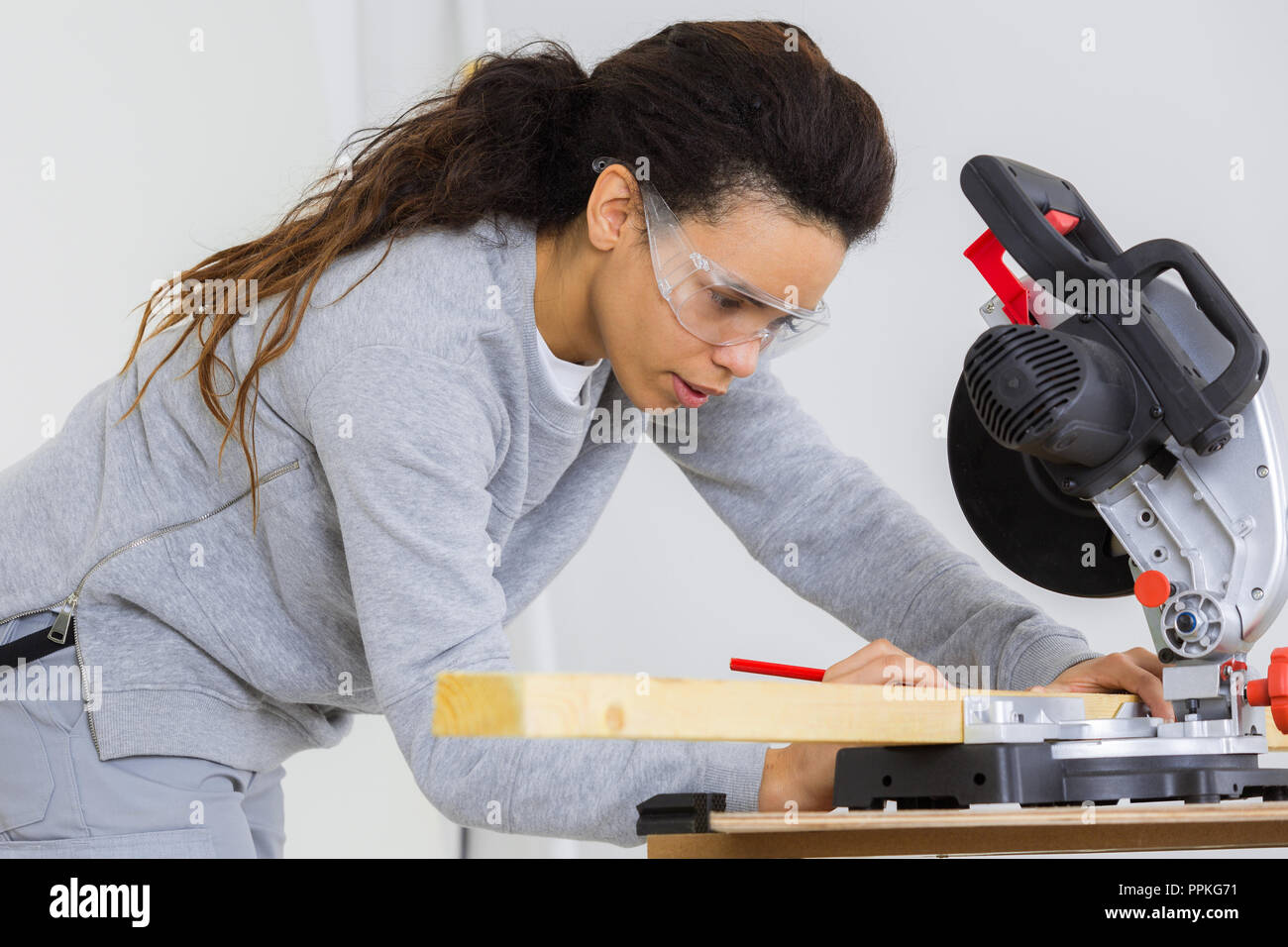 Female carpenter at work Stock Photo - Alamy