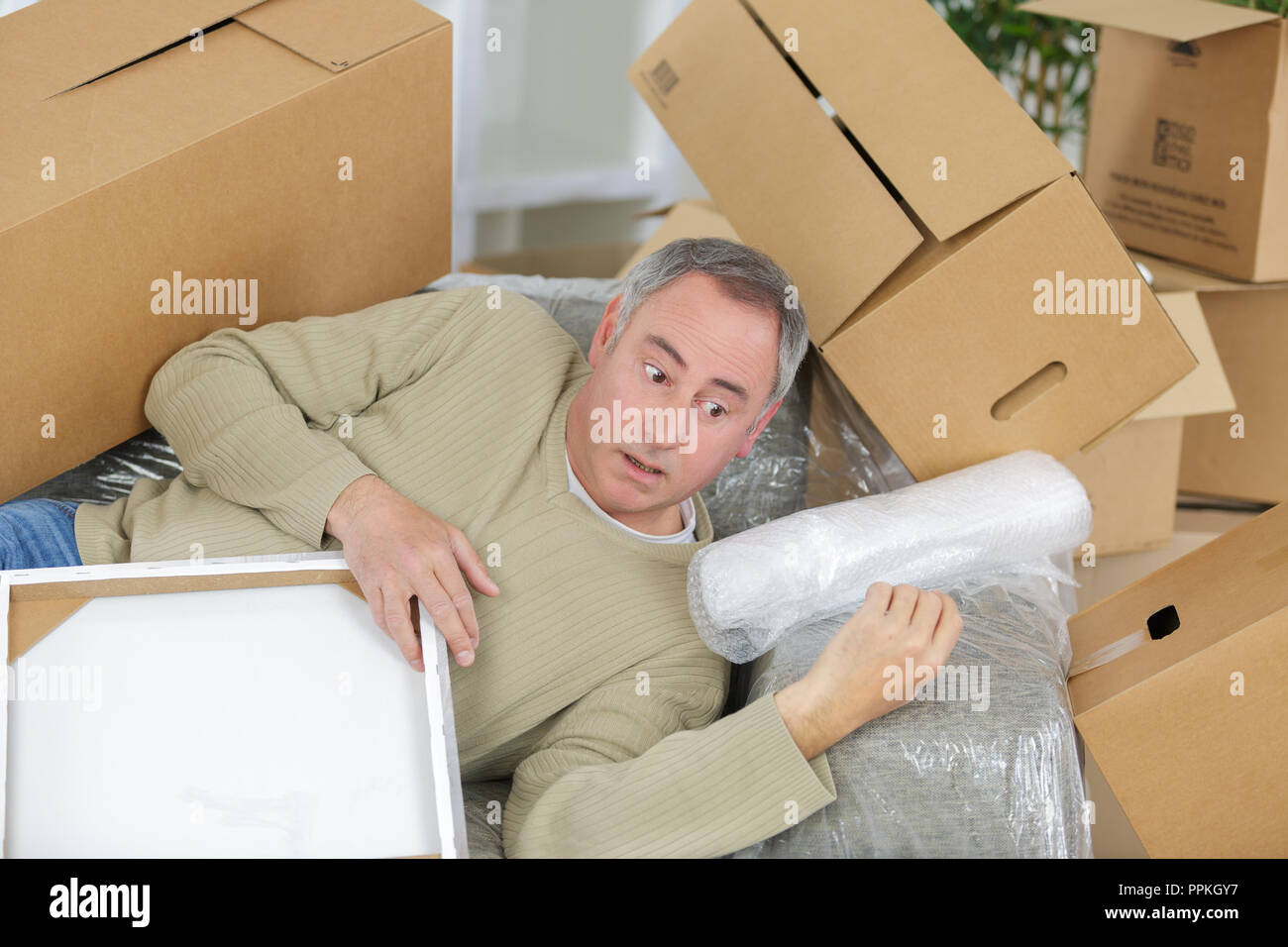 man in cardboard box Stock Photo - Alamy