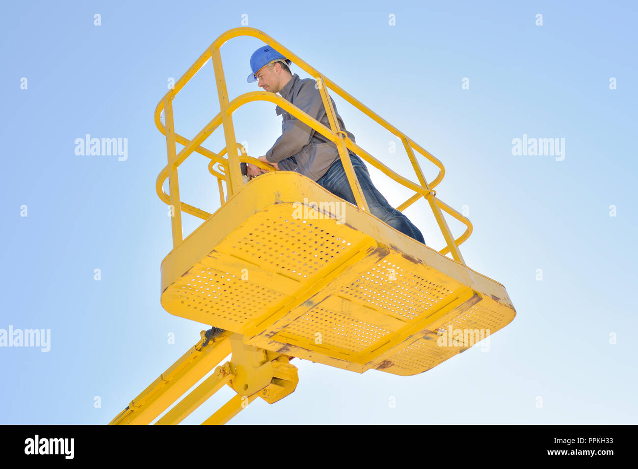 Man in cherry picker hi-res stock photography and images - Alamy
