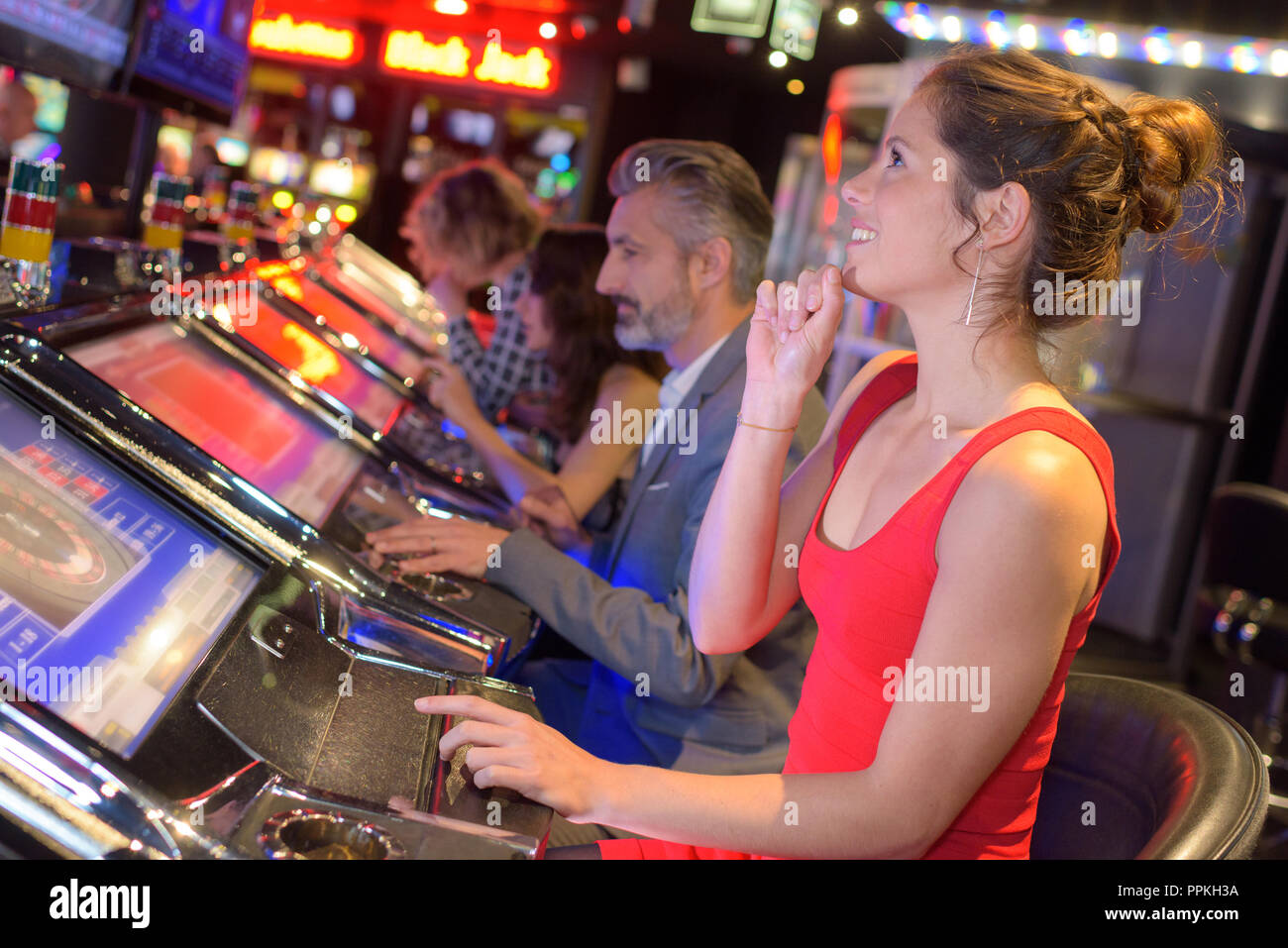 Group of young people in casino hi-res stock photography and images - Alamy