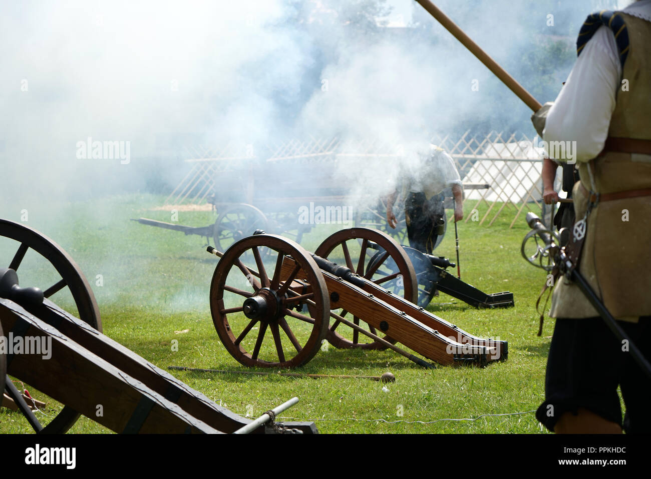 Old cannons were loaded according to traditional design and fired ...