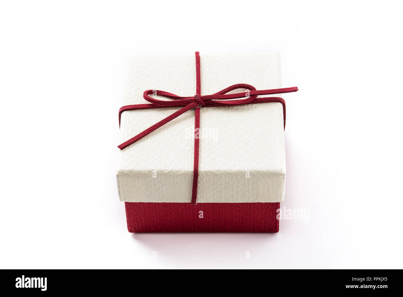 White and red gift box isolated on white background Stock Photo - Alamy