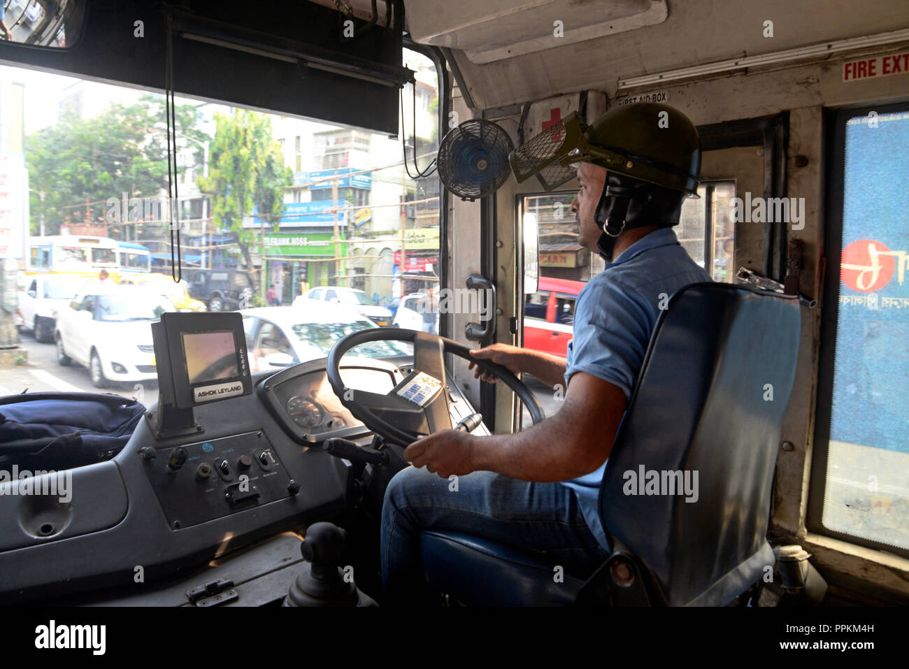Kolkata, India. 26th Sep, 2018. Government bus drivers wear helmet as ...