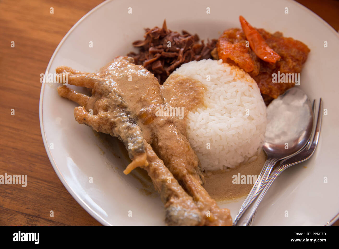 indonesian traditional food, gudeg ceker Stock Photo - Alamy