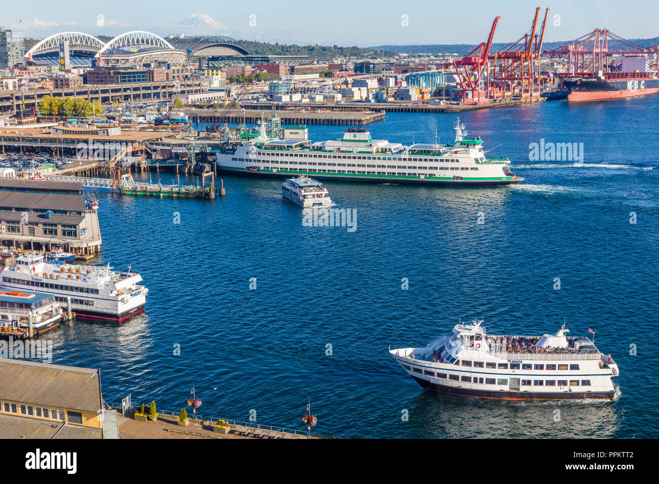 Aerial view of ferries and waterfront harbor area of Seattle Washington ...