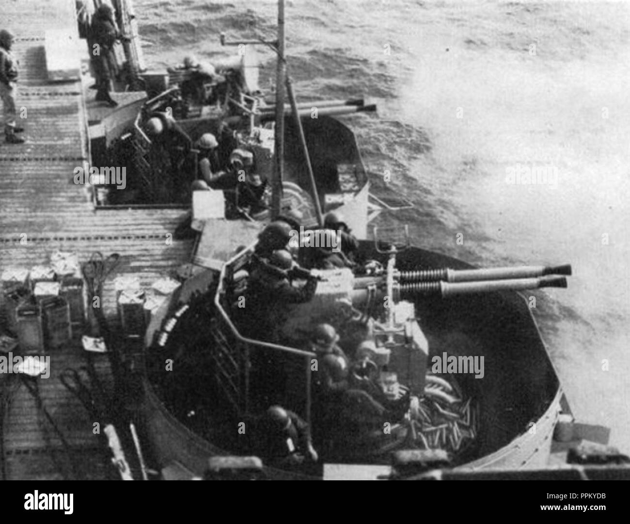 Bofors 40mm guns firing aboard USS Bairoko (CVE-115) circa in 1952 ...