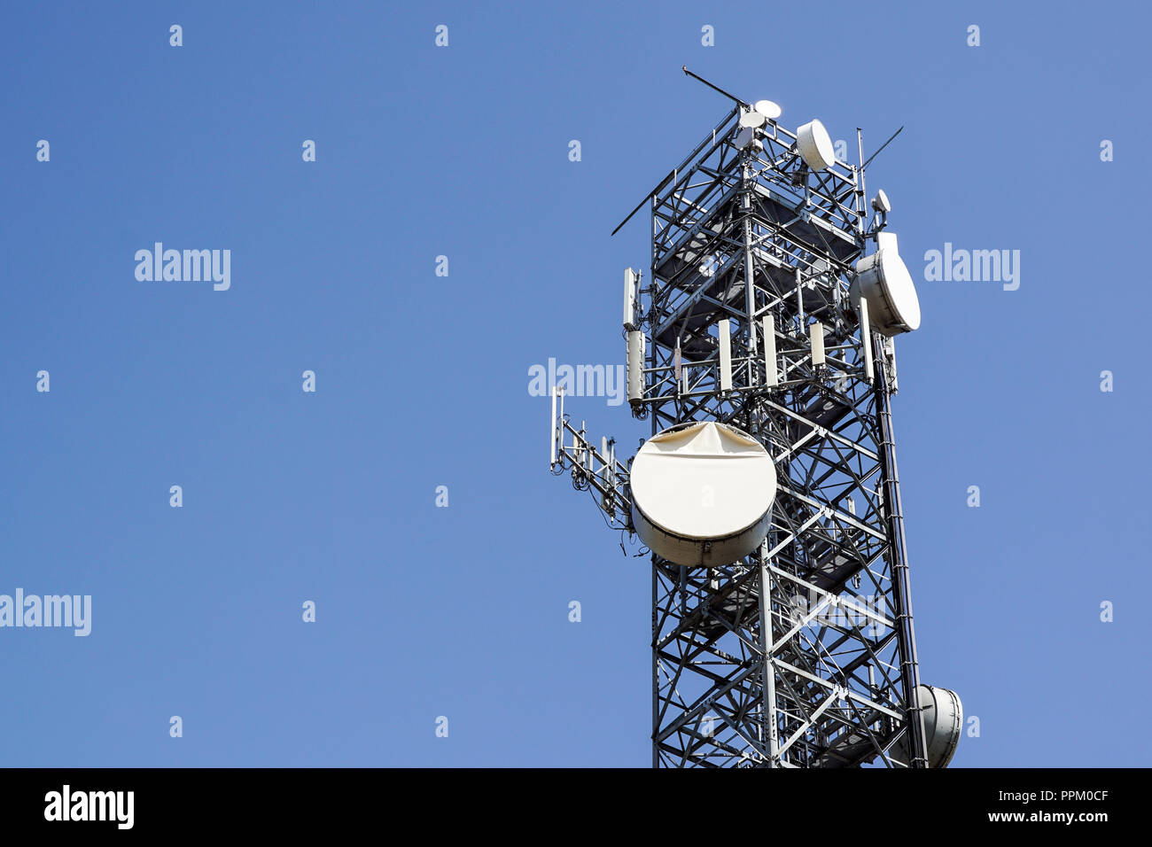 Antenna tower,antenna tower building with the blue sky. Close-up of the ...
