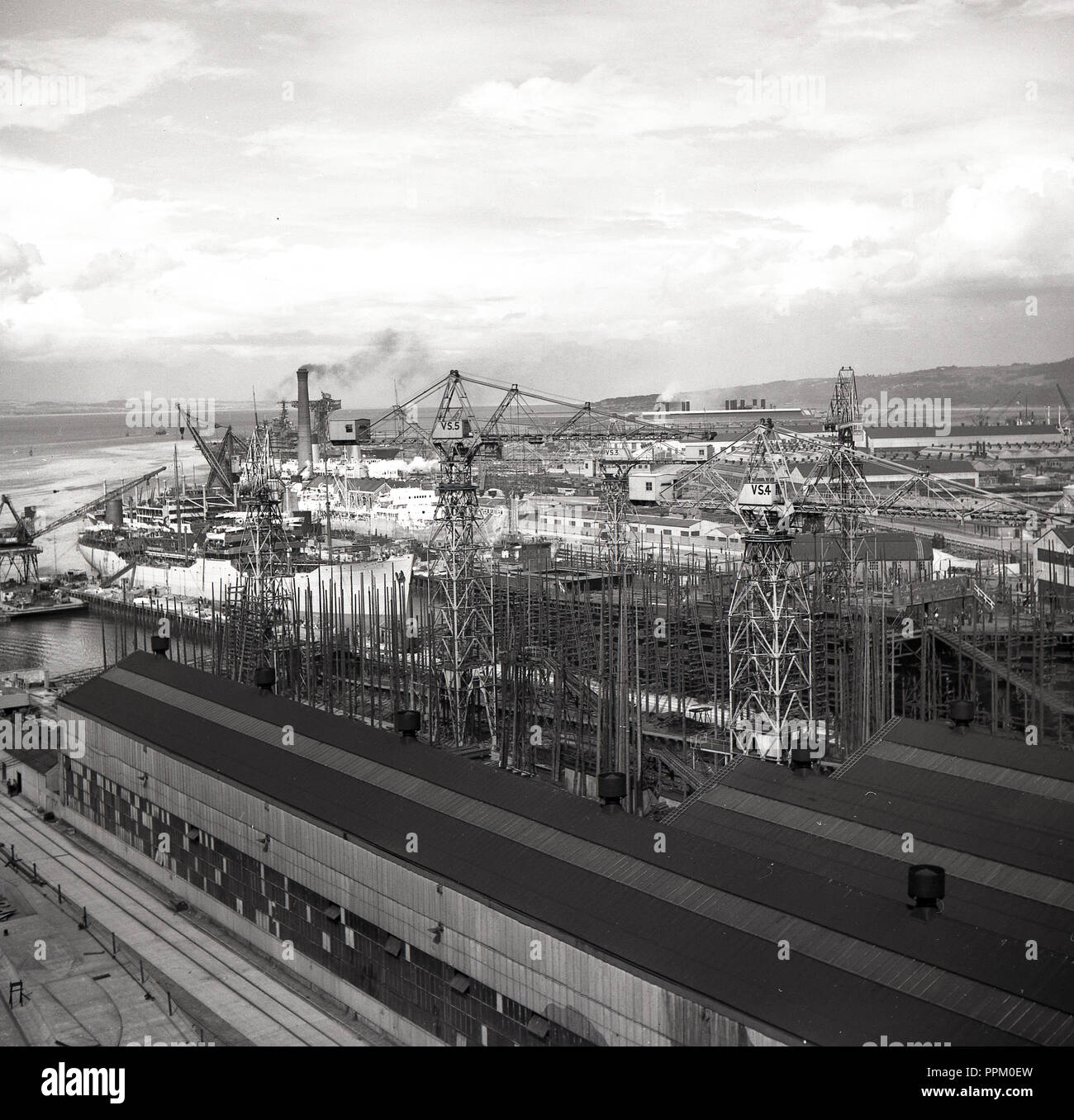1950s, historical, an aerialview of the Harland and Wolff shipyard ...