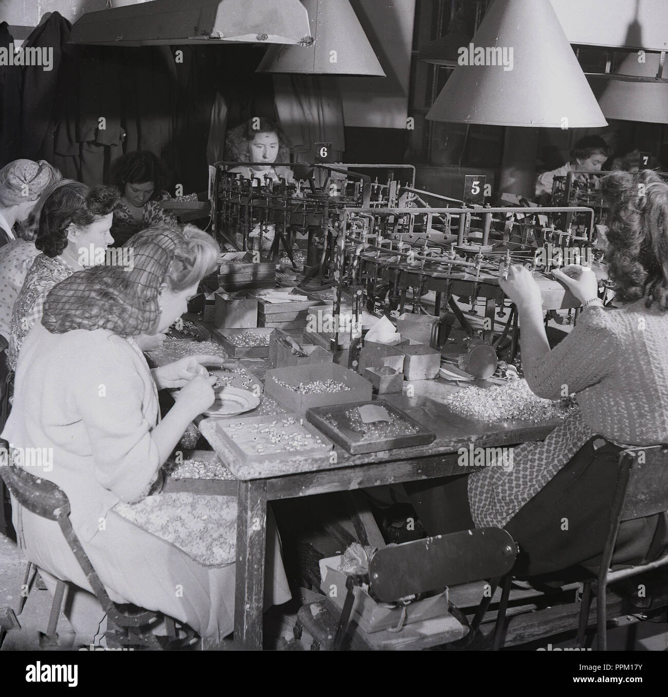 1950s, historical, women working at a factory of the Ever Ready Company ...
