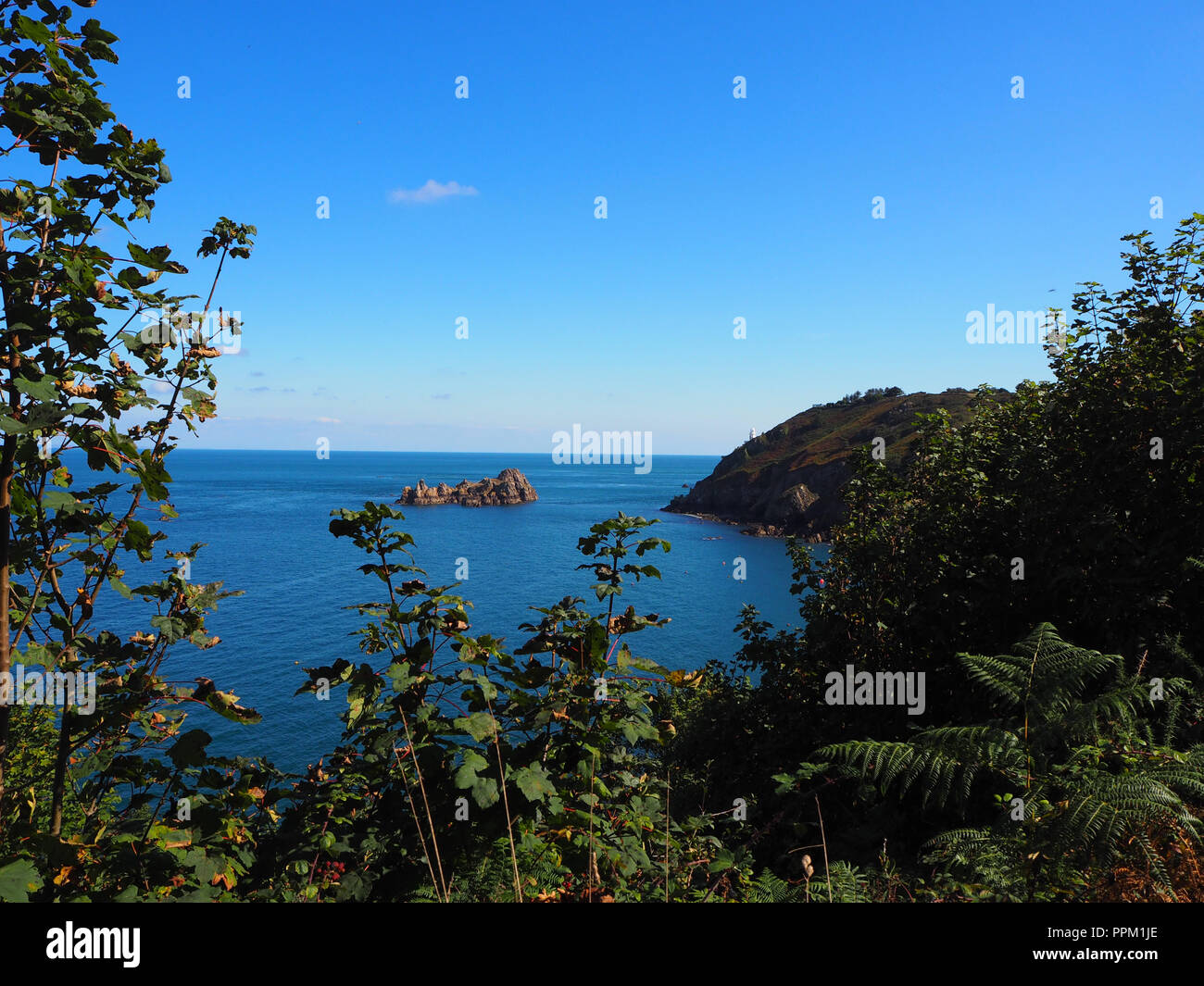 Trekking on the Island of Sark. Looking out to sea. Beautiful coastal ...