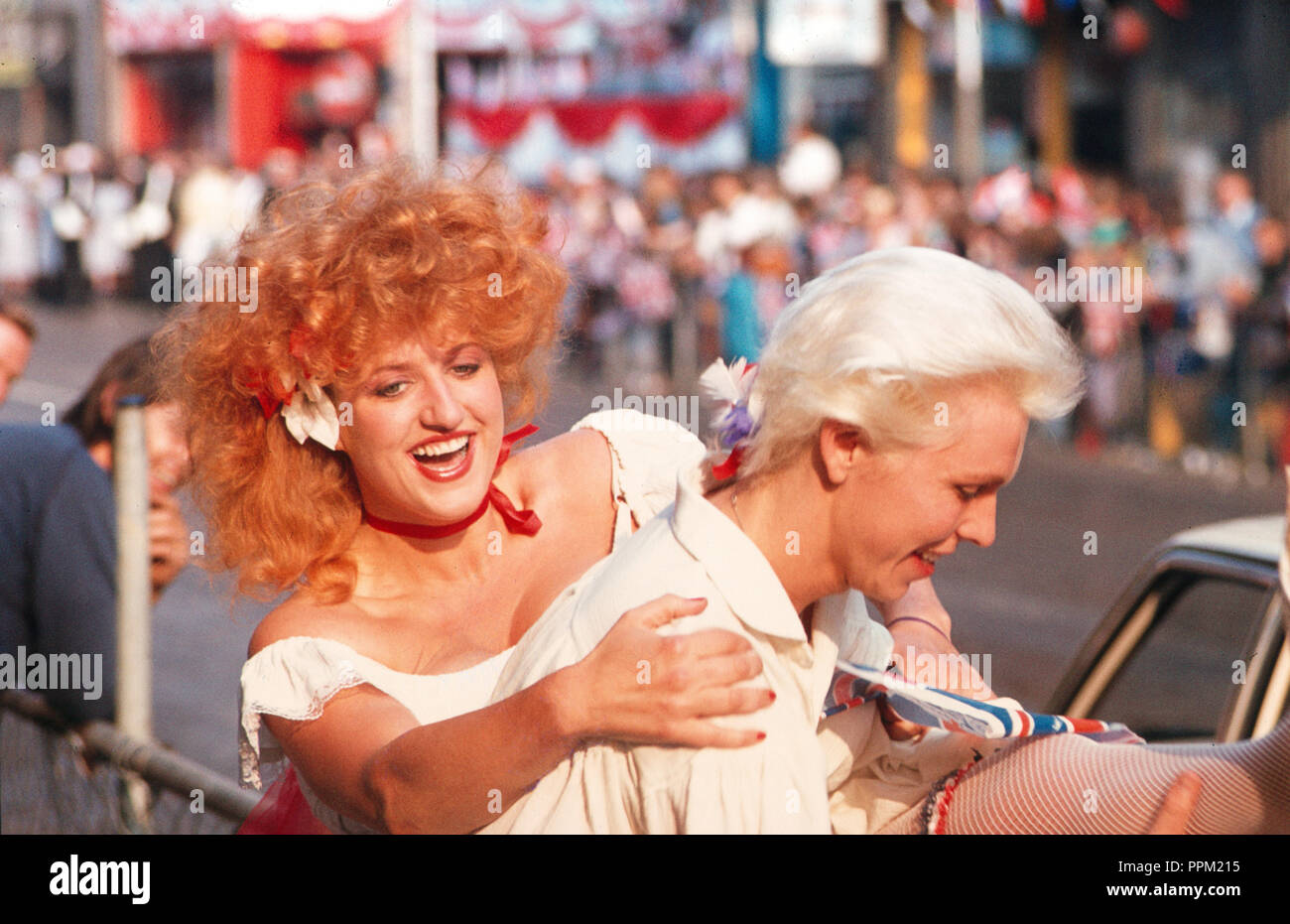 Actress Eve Ferret being carried over the barriers in Fleet Street ...