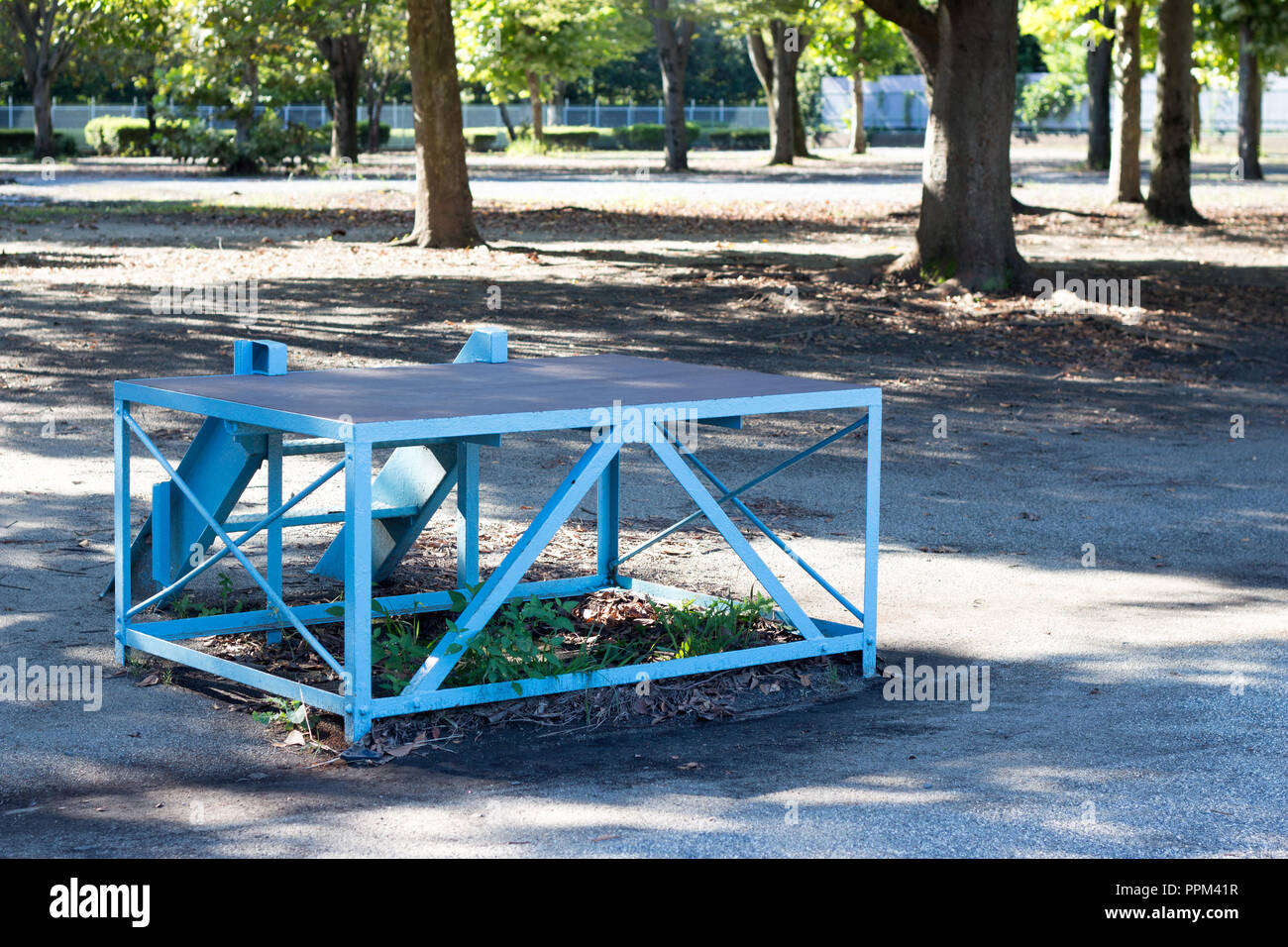 Small blue platform for speech in Japanese park Stock Photo - Alamy