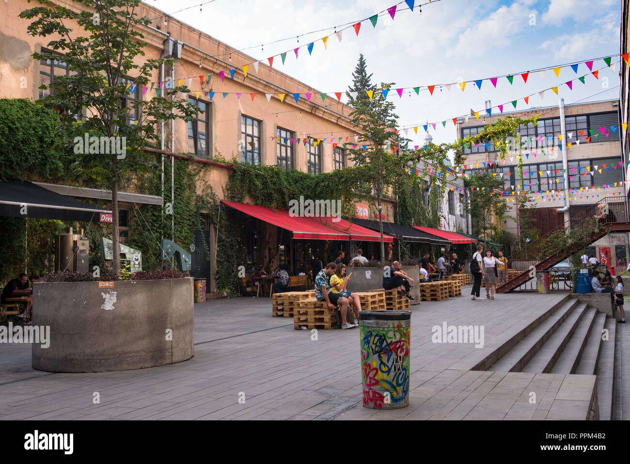 Restaurants and bars in the main courtyard of Fabrika in Tbilisi ...