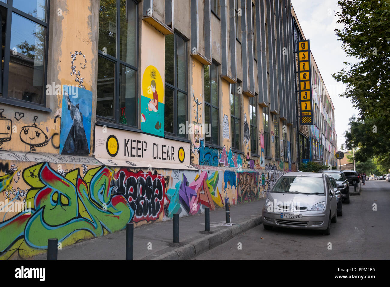 Street art and graffiti on the front of Fabrika in the centre of ...