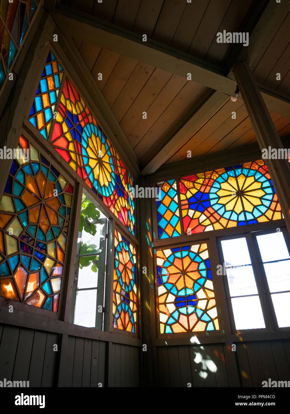 Intricate stained glass window in an apartment building and gallery in ...