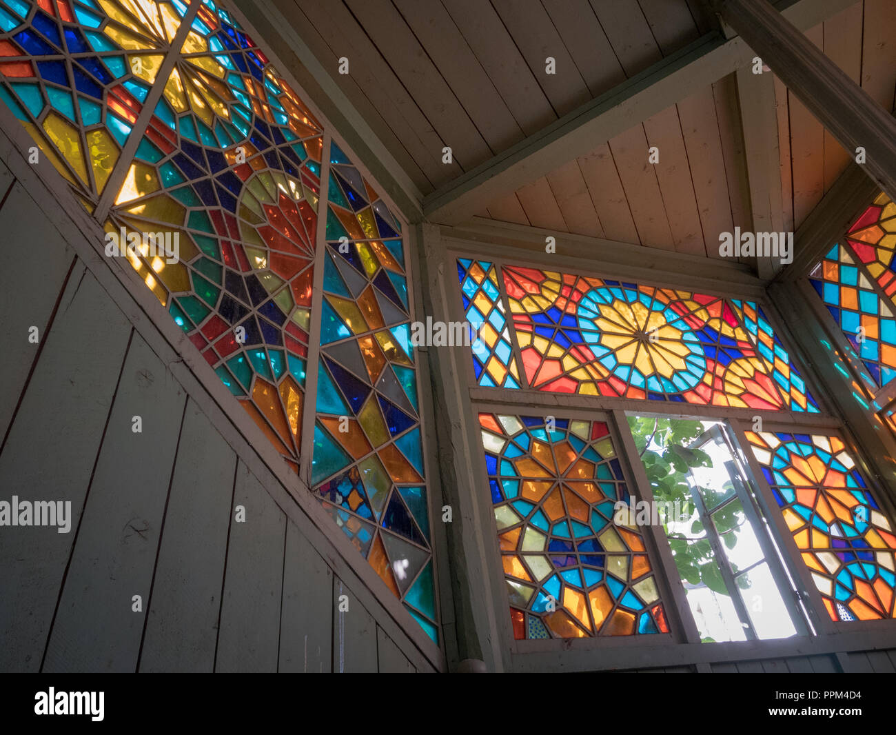 Intricate stained glass window in an apartment building and gallery in ...