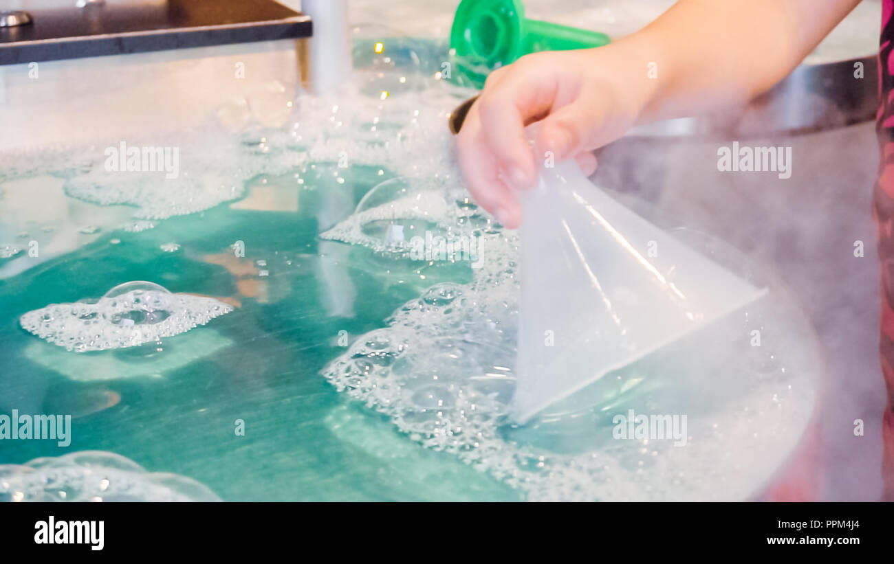 Kids science with bubbles at local science museum Stock Photo - Alamy