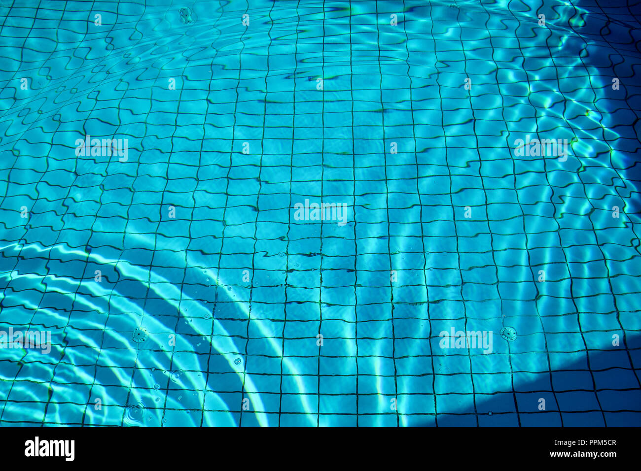 Swimming pool bottom caustics ripple and flow with waves background ...