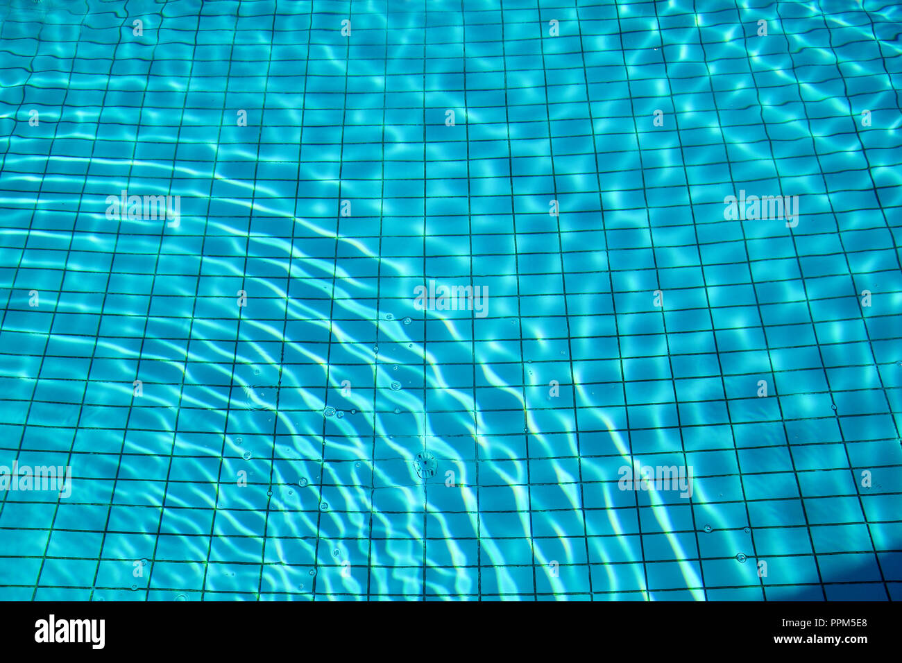 Blue ripped water in swimming pool. Swimming pool bottom caustics ...