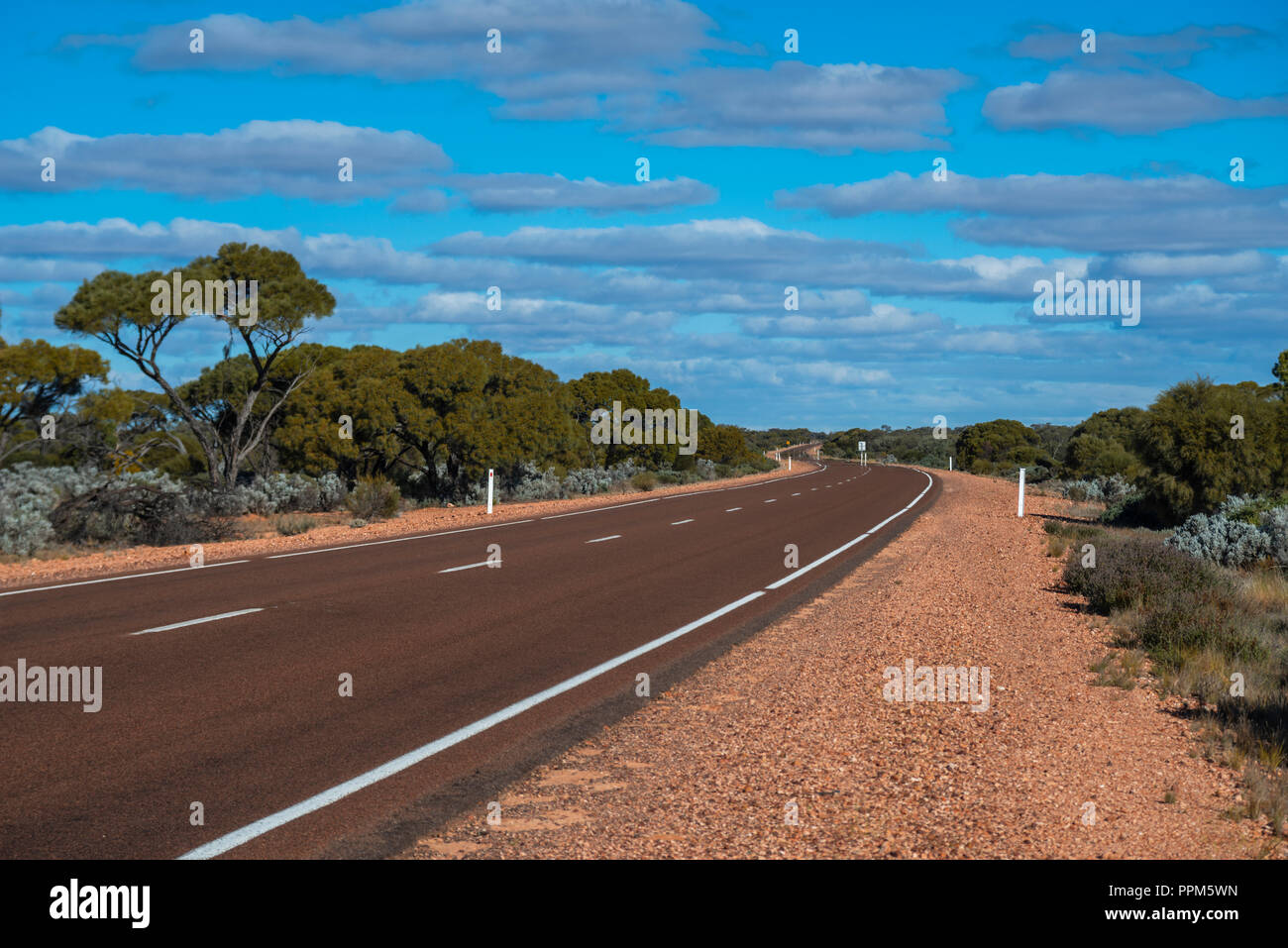 Empty road leading through the australian bush, outback, South ...