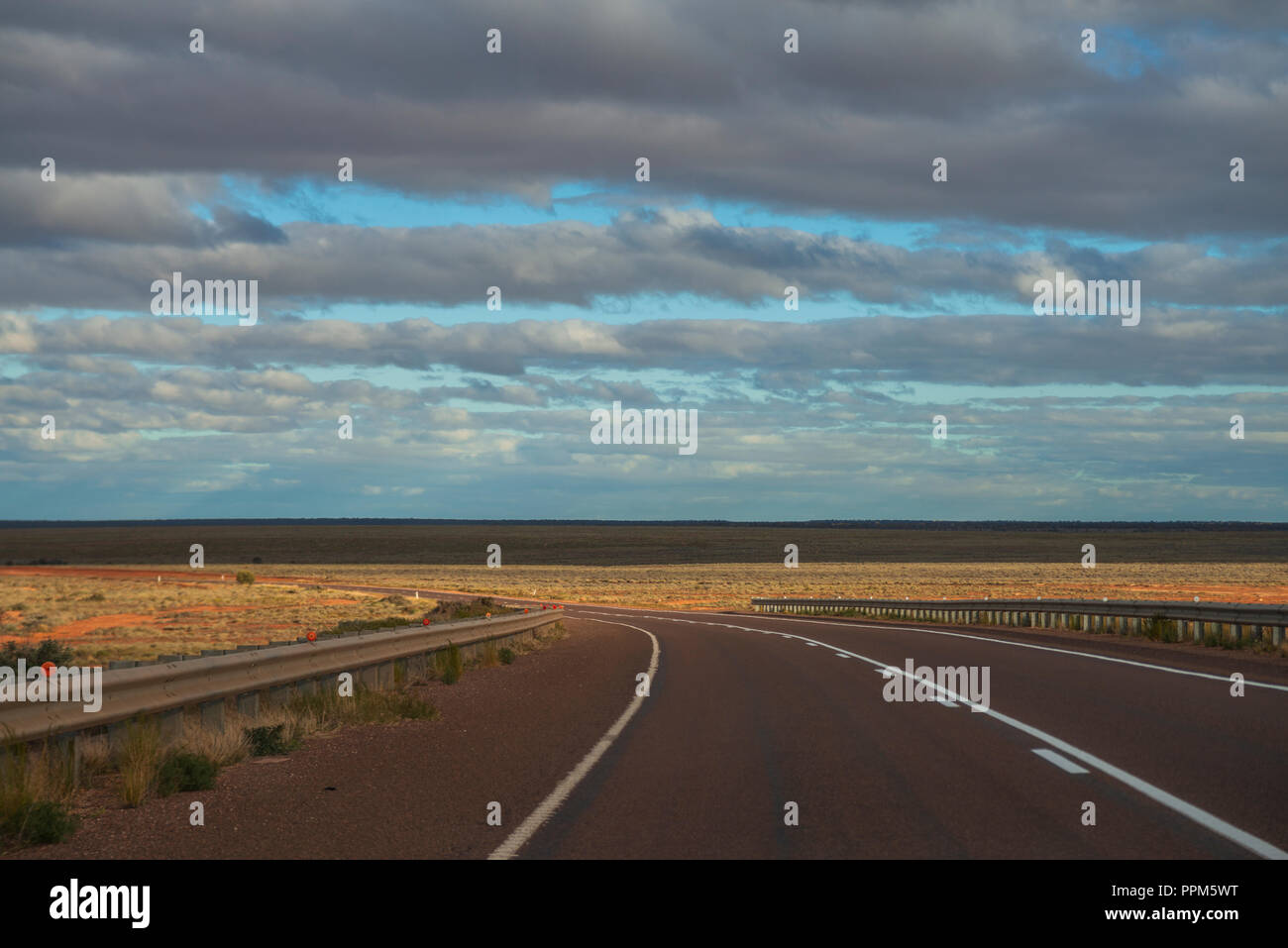 Empty road leading through the australian bush, outback, South ...