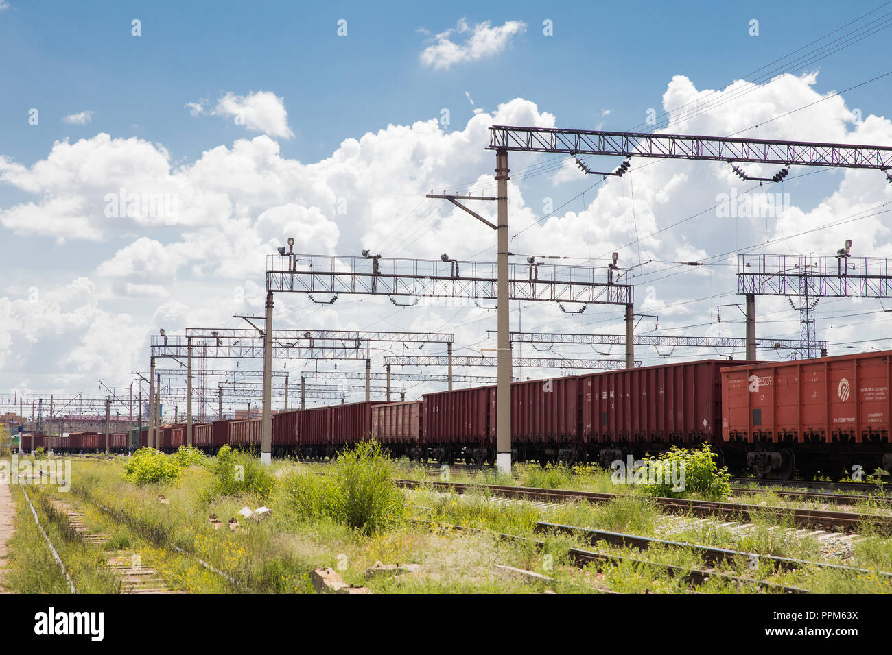 Trains with freight cars and freight cars stand on the railway side ...