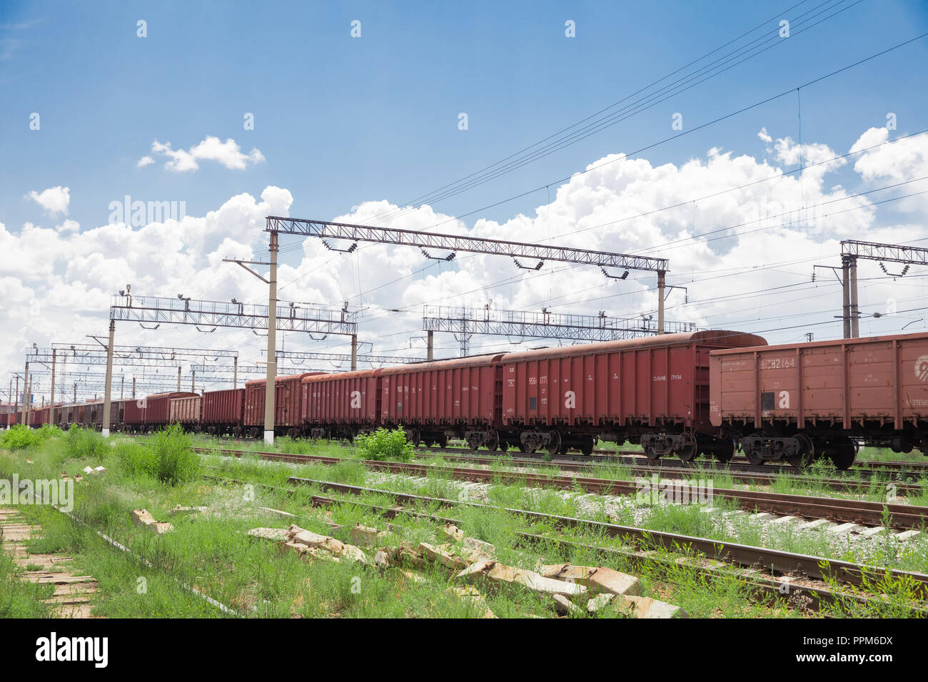 Trains with freight cars and freight cars stand on the railway side ...