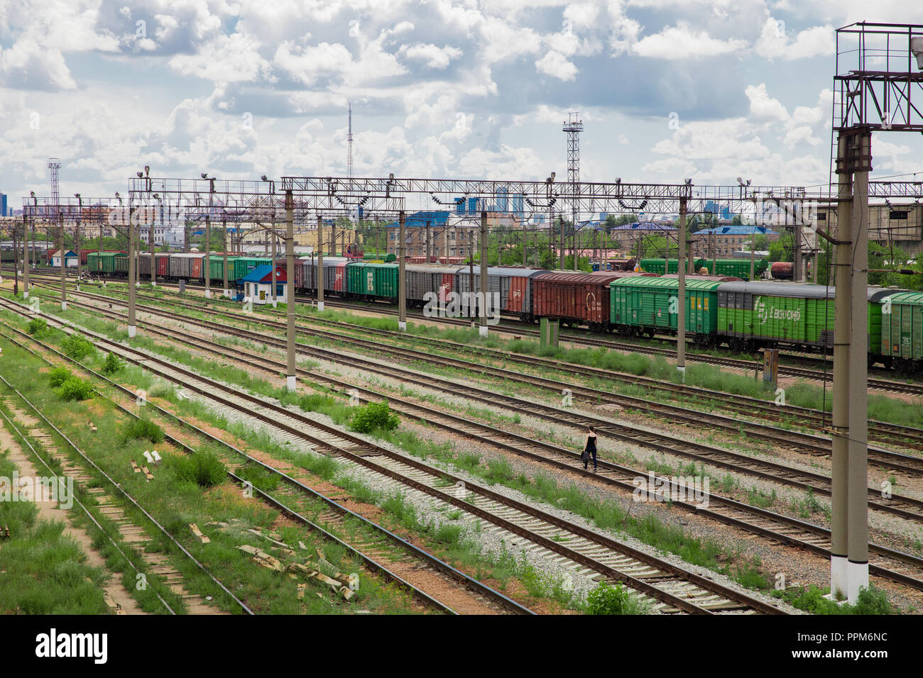Trains with freight cars and freight cars stand on the railway side ...