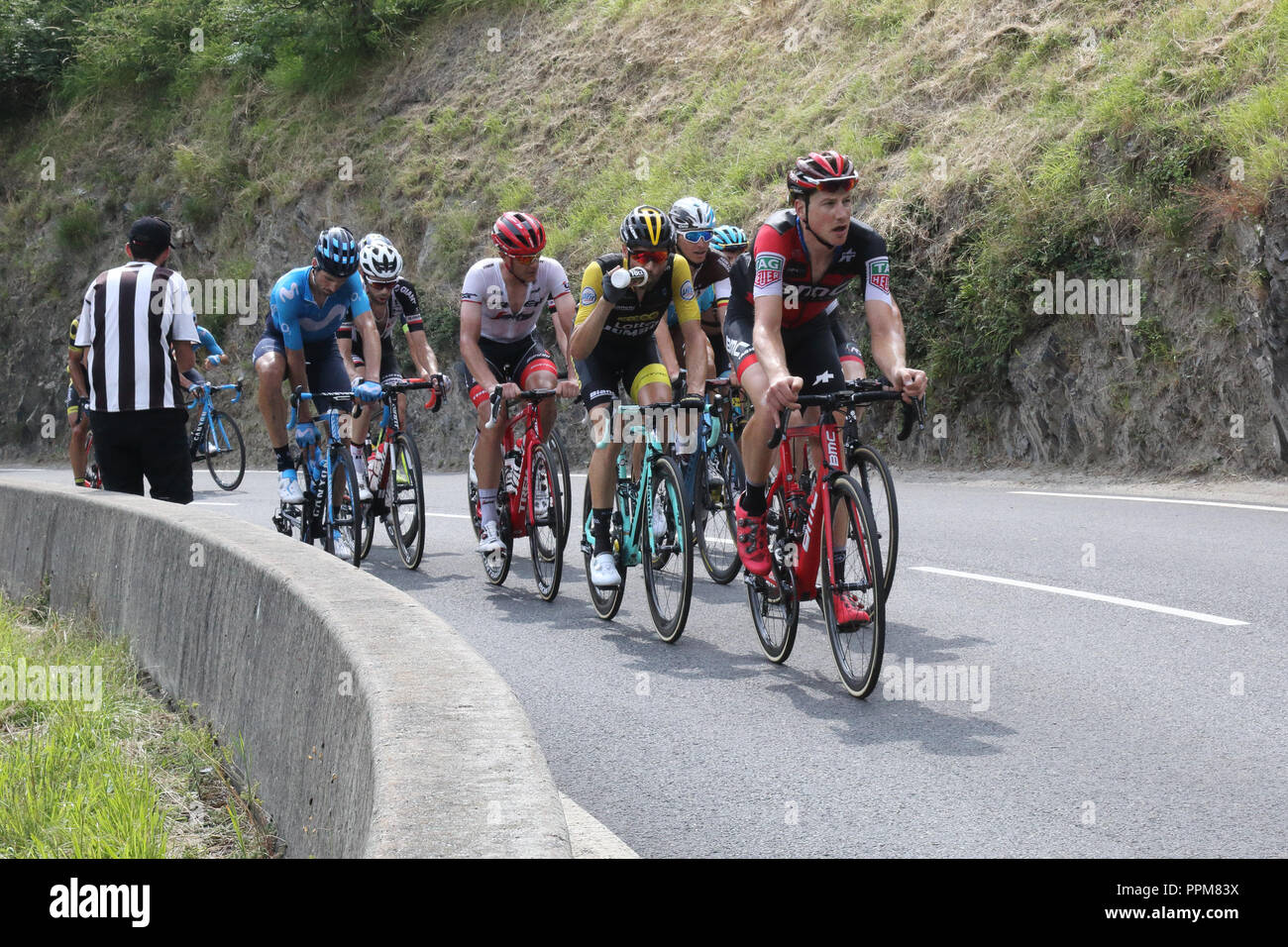 A group of cyclists climbing during the 2018 Tour de France 17th stage ...