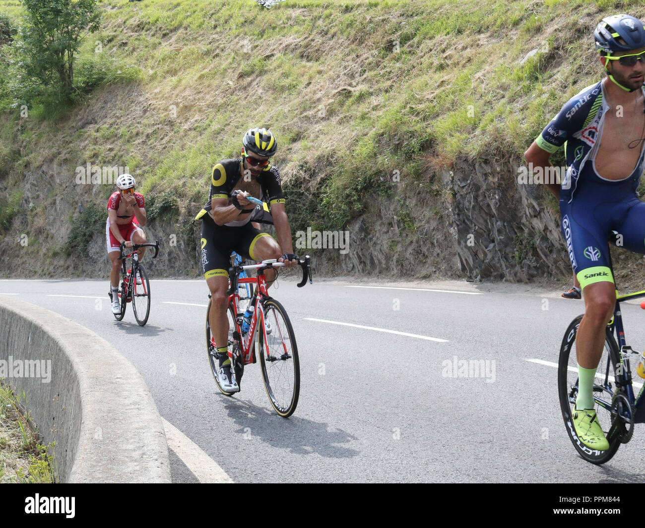 A group of cyclists climbing during the 2018 Tour de France 17th stage ...