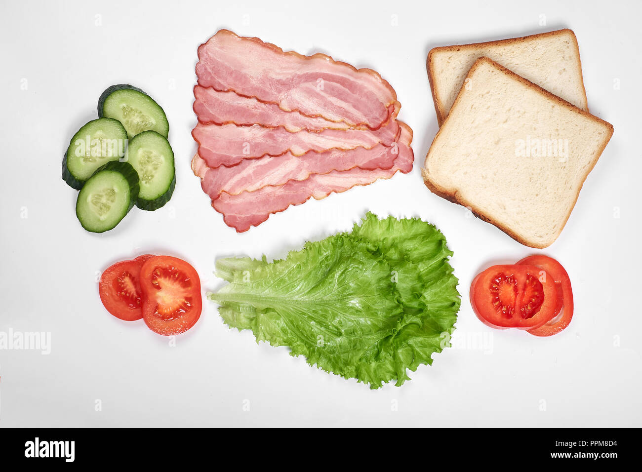 Ingredients for making sandwich. fresh vegetables, tomatoes, bread ...