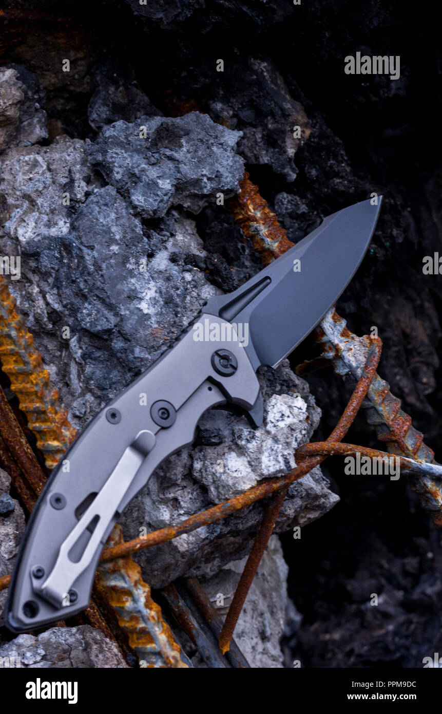 Knife with a clip on the pocket. Vertical frame of the knife Stock ...