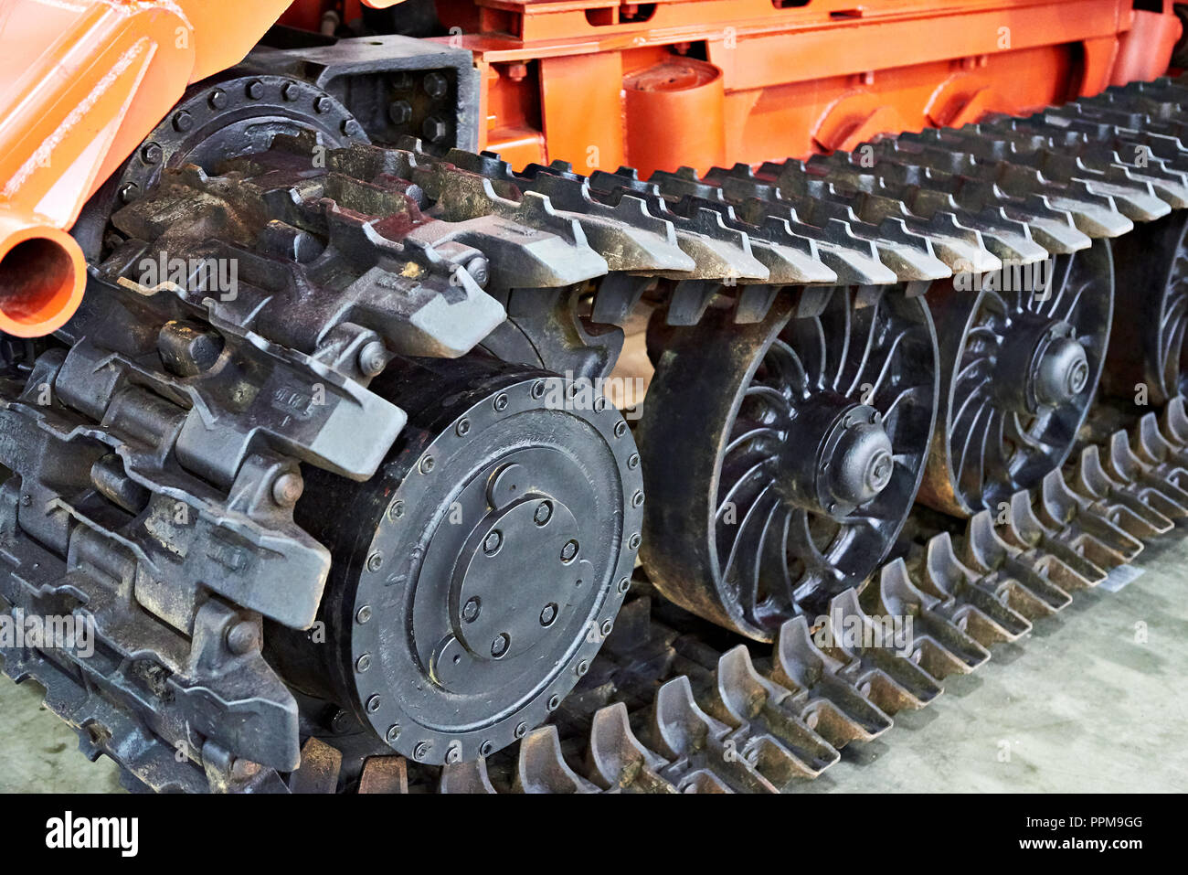 Continuous track of construction vehicle Stock Photo - Alamy