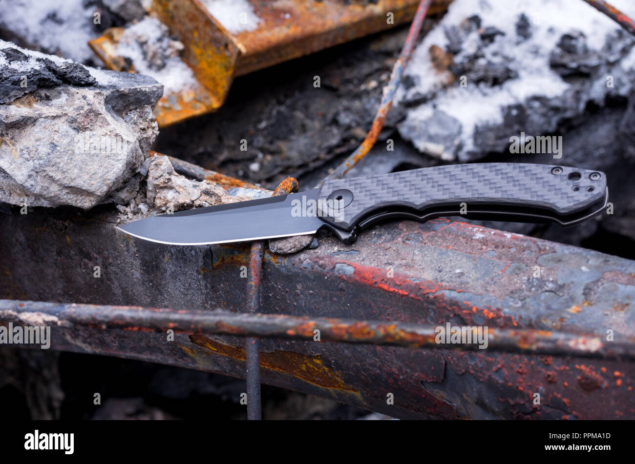 Knife with a black blade and handle. Top view Stock Photo - Alamy