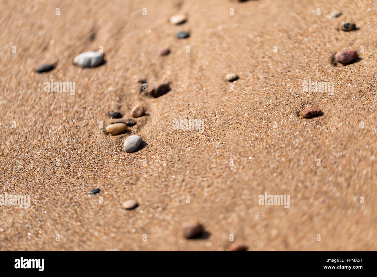 Small pebbles on the beach Stock Photo - Alamy
