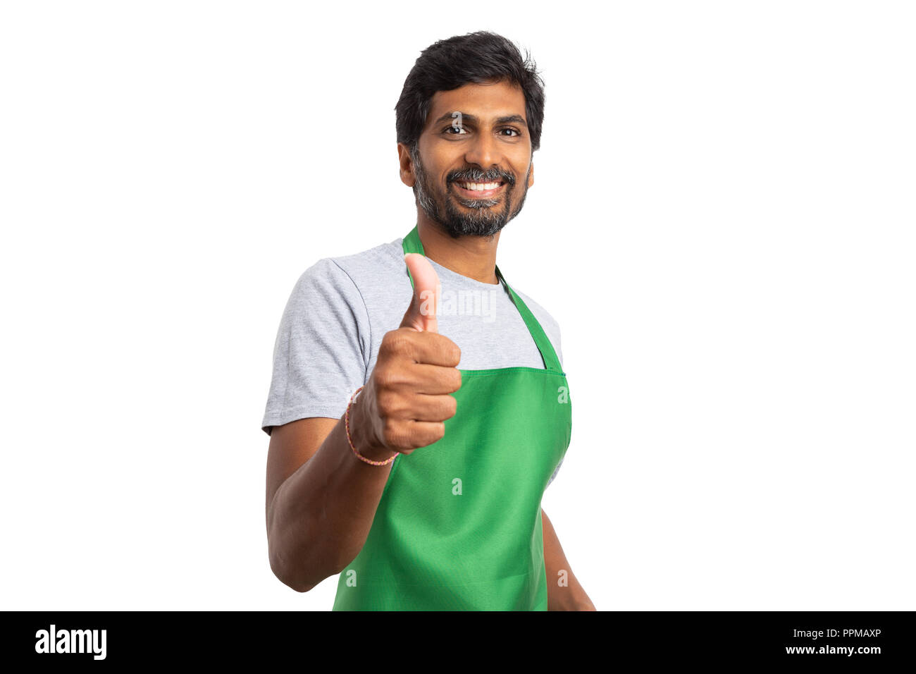 Supermarket or hypermarket male indian staff making thumb up like ...