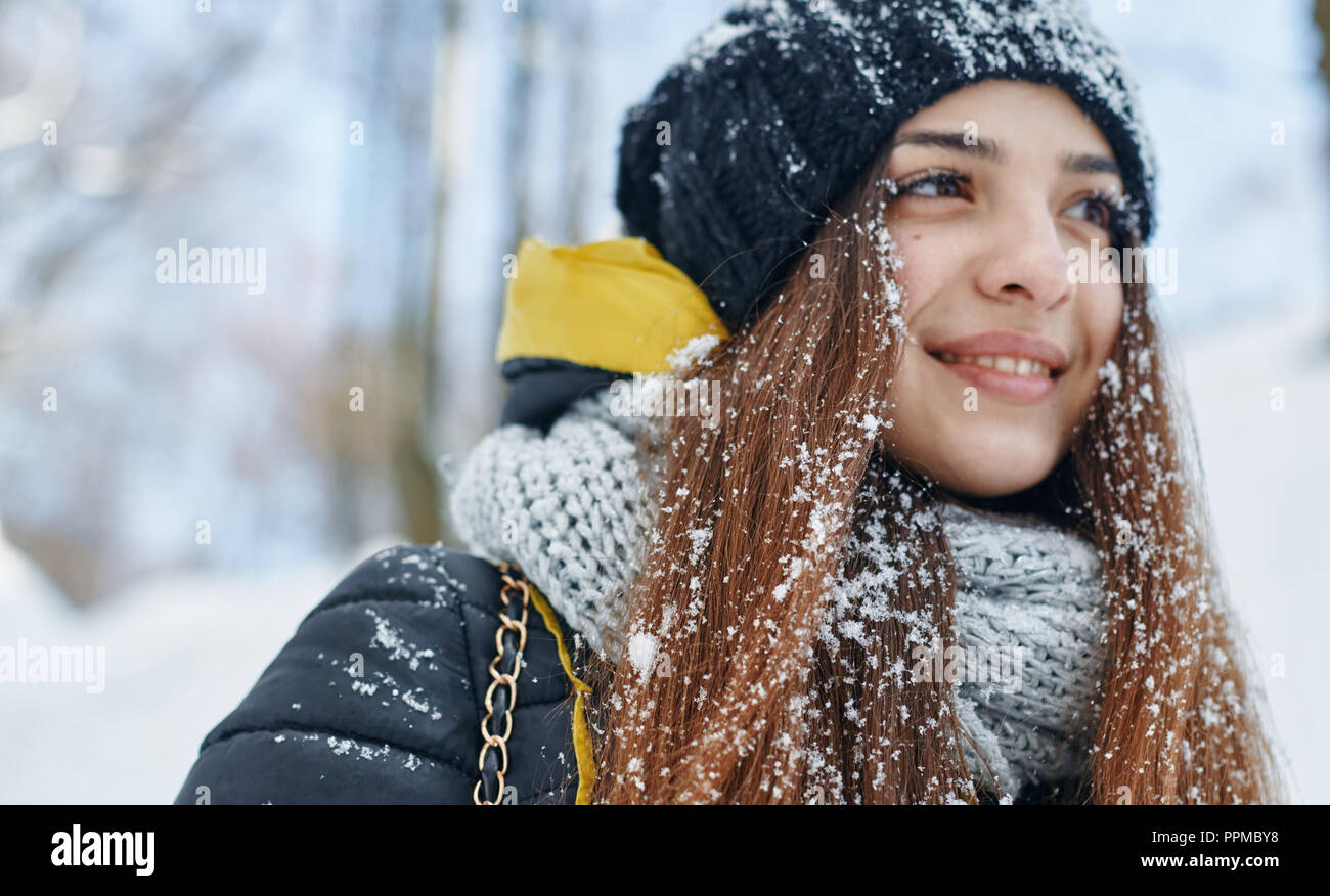beautiful young smiling woman outside in the winter Stock Photo - Alamy