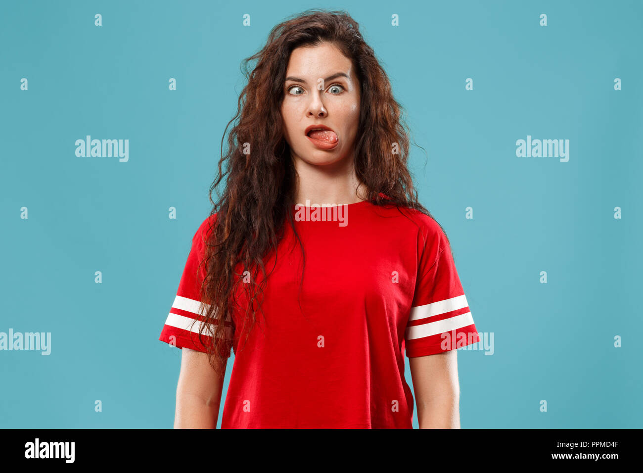 Horrible, stress, shock. Female half-length portrait isolated at blue ...