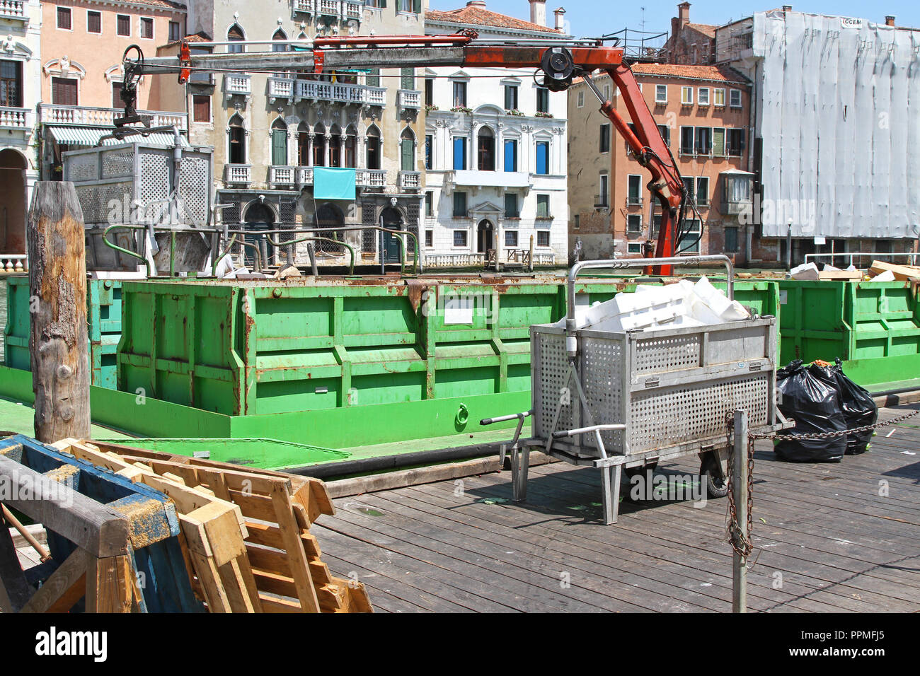 Barge with crane for transport in Venice Italy Stock Photo - Alamy