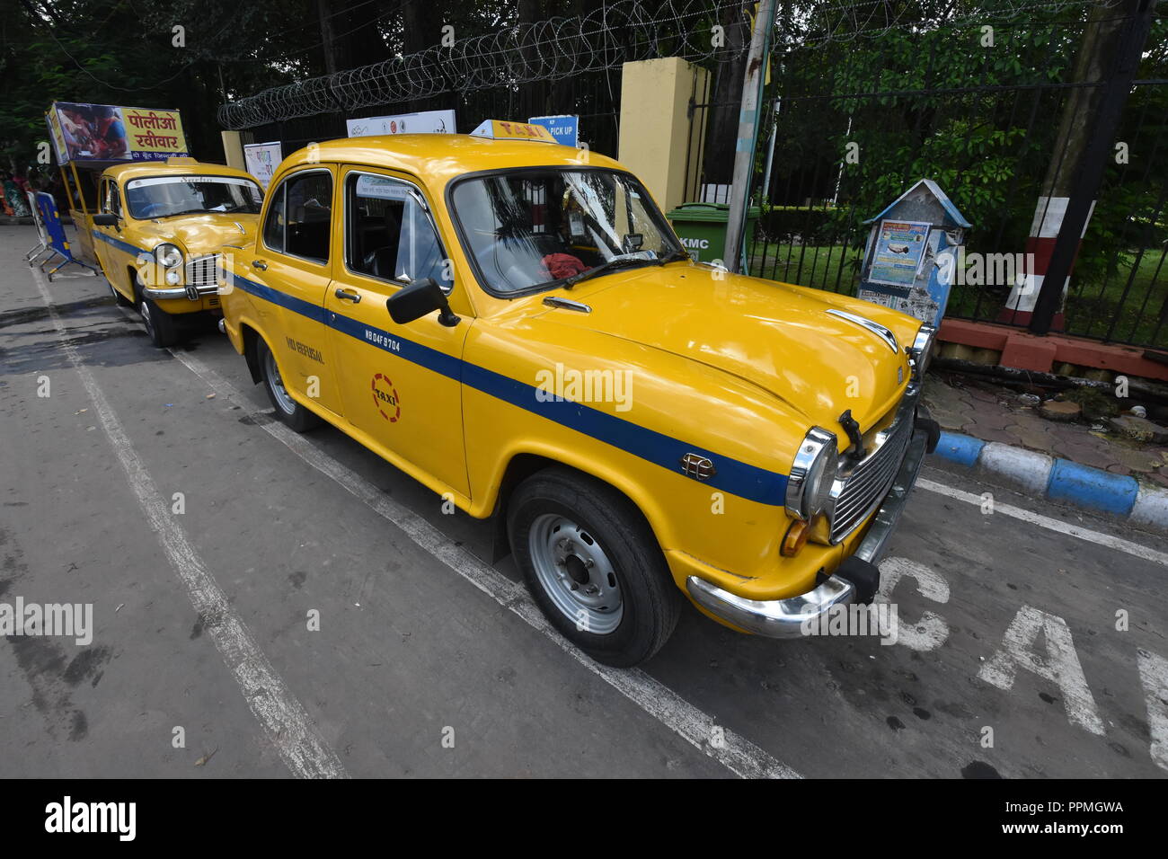 Yellow Ambassador diesel taxi in Kolkata, India Stock Photo - Alamy