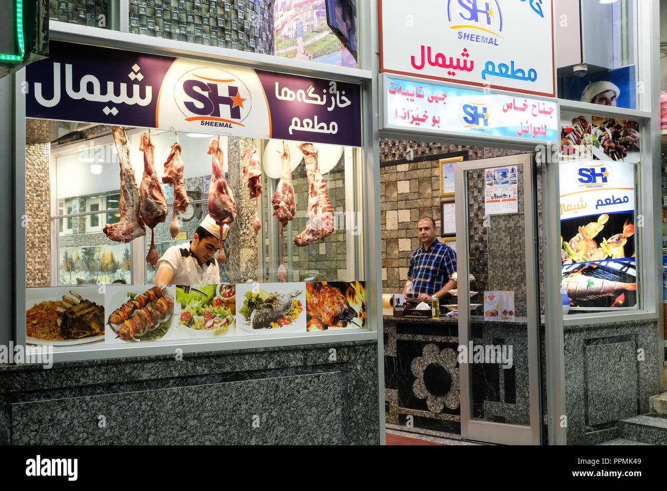 Lamb legs in a window of a falafel and shawarma restaurant in the ...