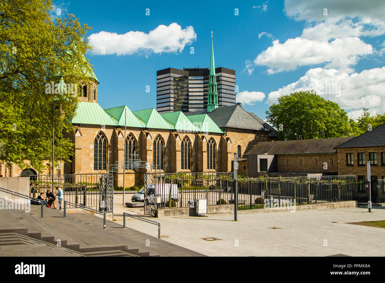 Cathedral in Essen and modern business tower, city skyline Stock Photo ...