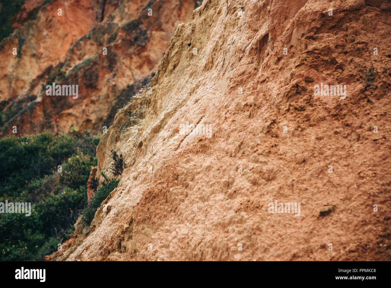 Sandstone limestone rocks of reddish color in Portugal Stock Photo - Alamy