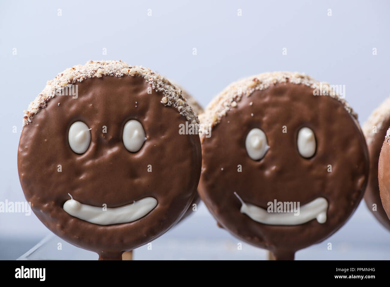 chocolate face shape smiley face cookie Stock Photo - Alamy