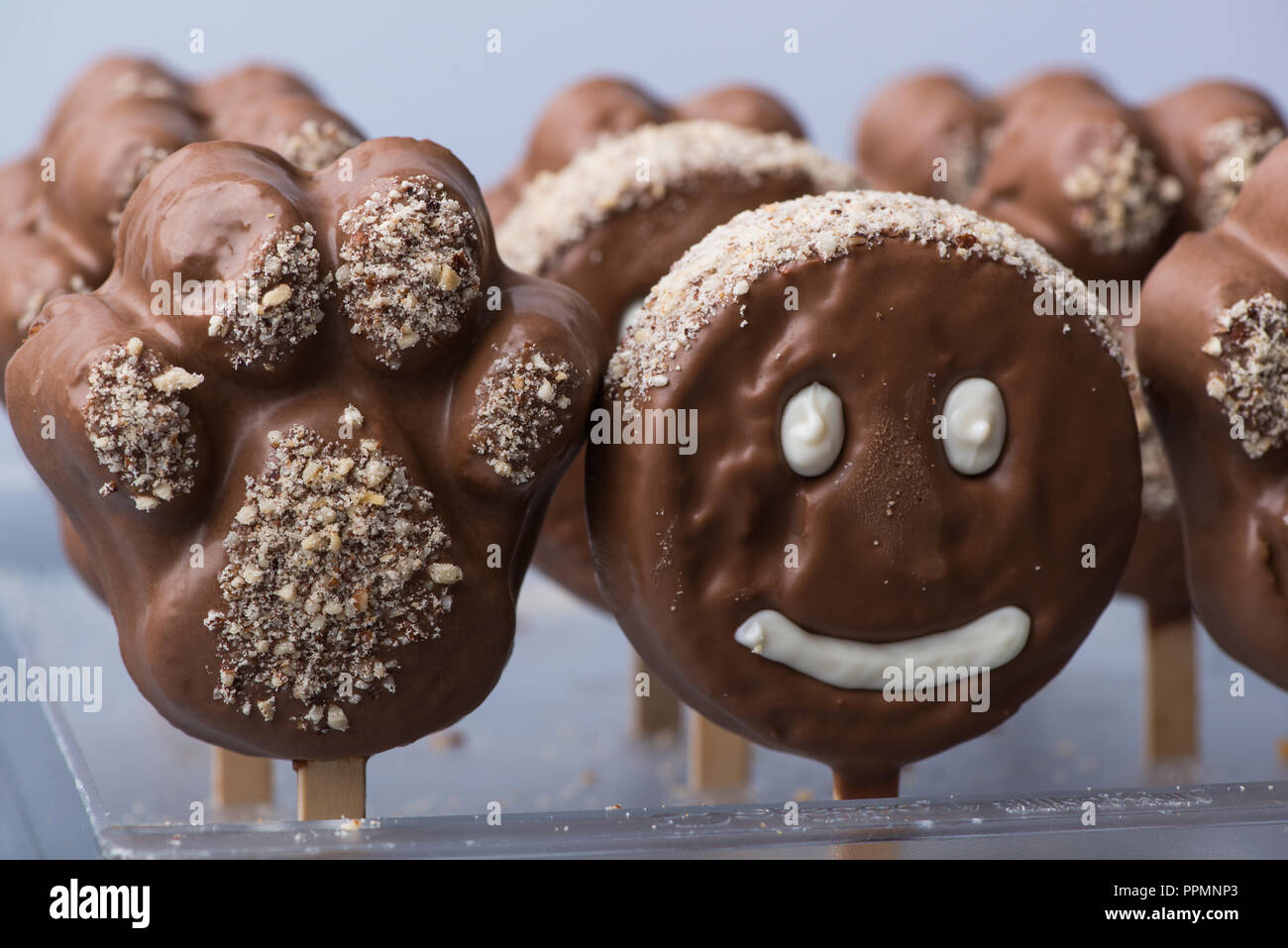chocolate face shape smiley face cookie Stock Photo - Alamy