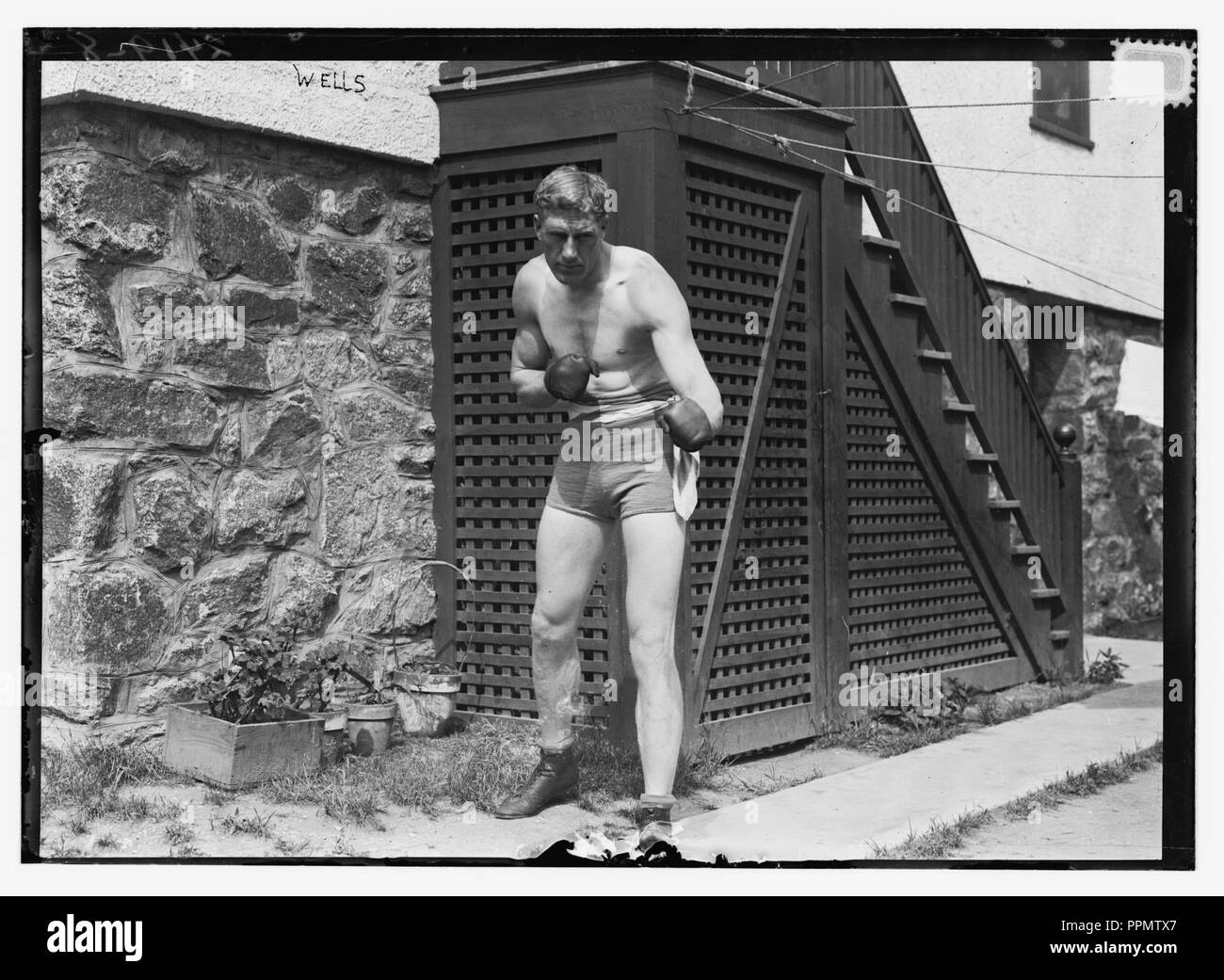 Bombardier Billy Wells, English boxer, preparing in Rye, N.Y., for ...