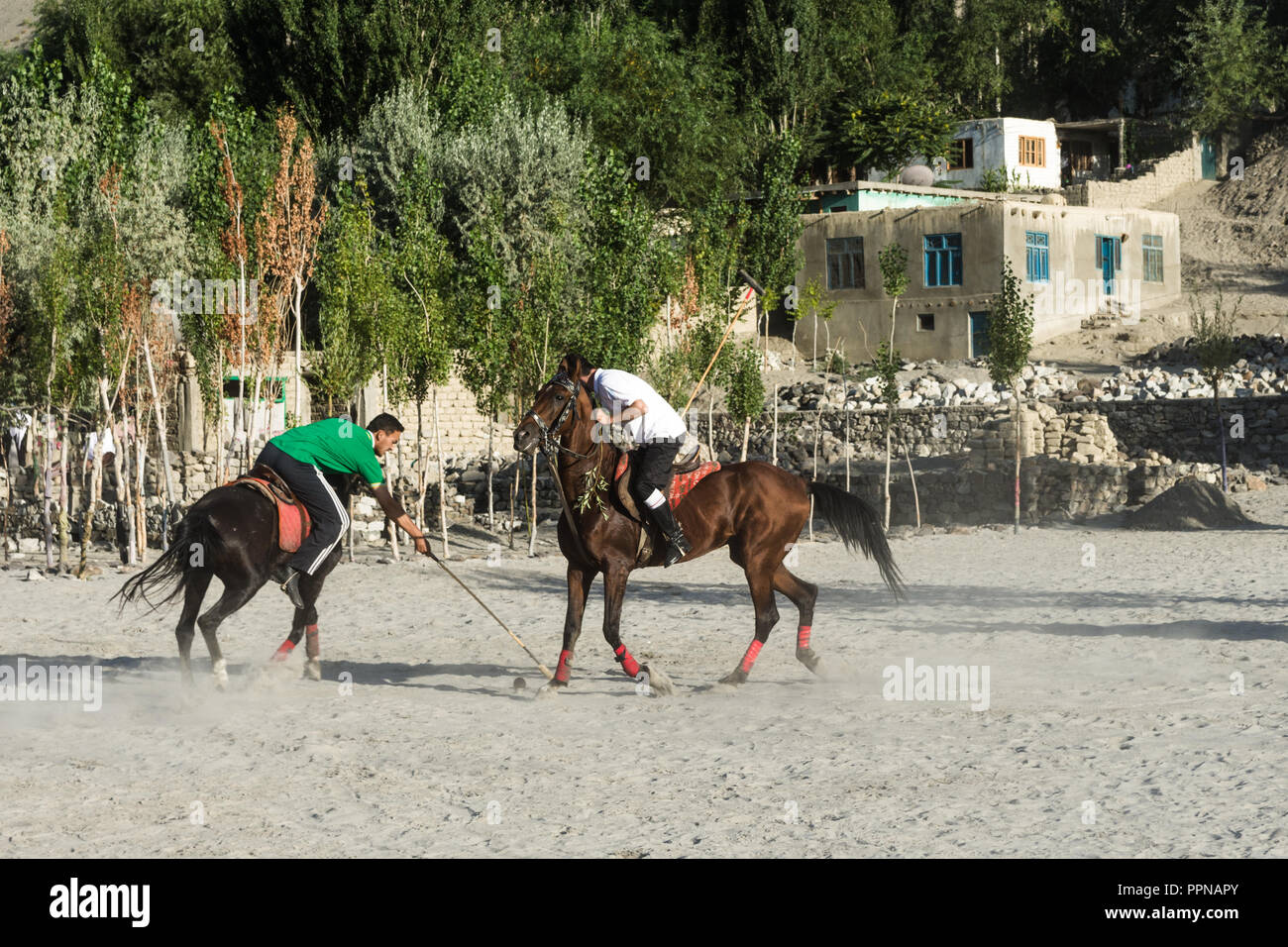 Local Pakistani men practicing polo on sand, Skardu, Gilgit-Baltistan ...