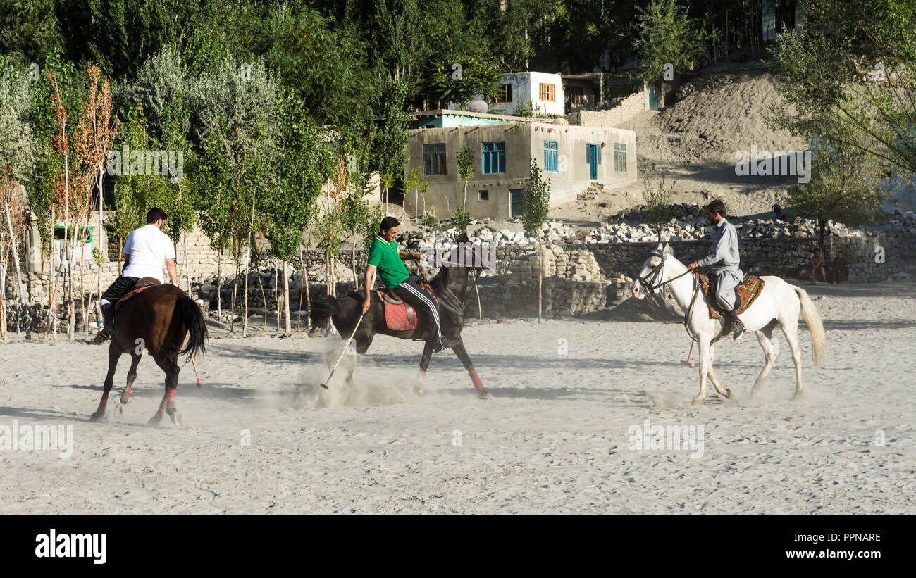 Local Pakistani men practicing polo on sand, Skardu, Gilgit-Baltistan ...