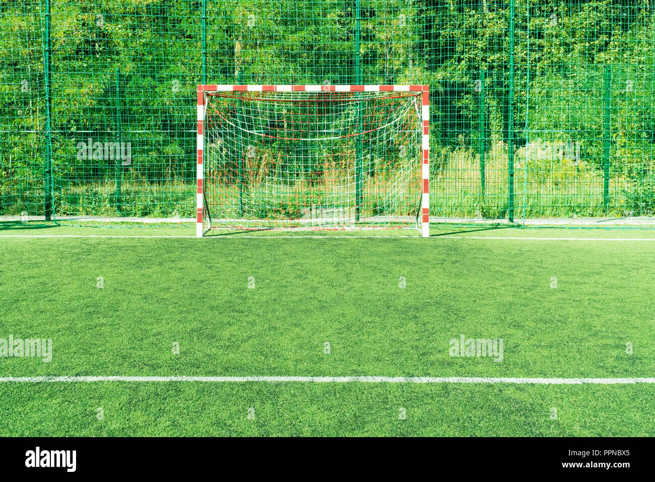 Mini football goal on an artificial grass hi-res stock photography and ...